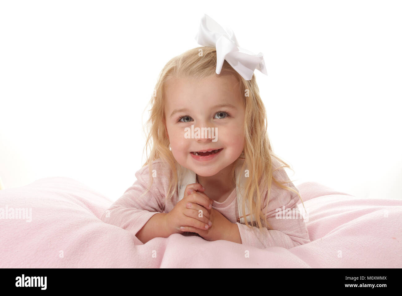 Pretty 3 Year Old Girl Playing On Soft Pink Blanket Stock Photo Alamy pretty-3-year-old-girl-playing-on-soft-pink-blanket-stock-photo-alamy