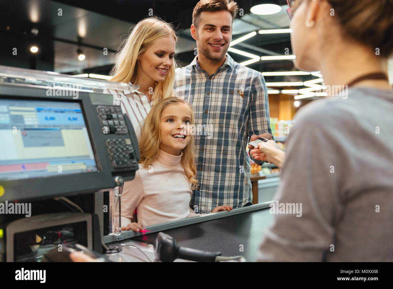 Clerk giving cash money customer hi-res stock photography and images ...