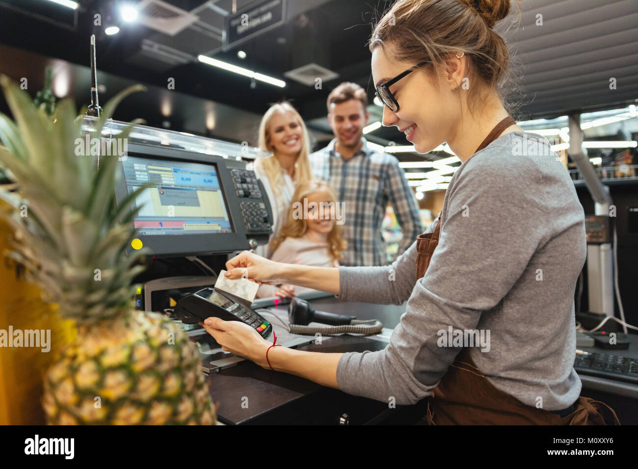 Family supermarket credit card cashier hi-res stock photography and ...