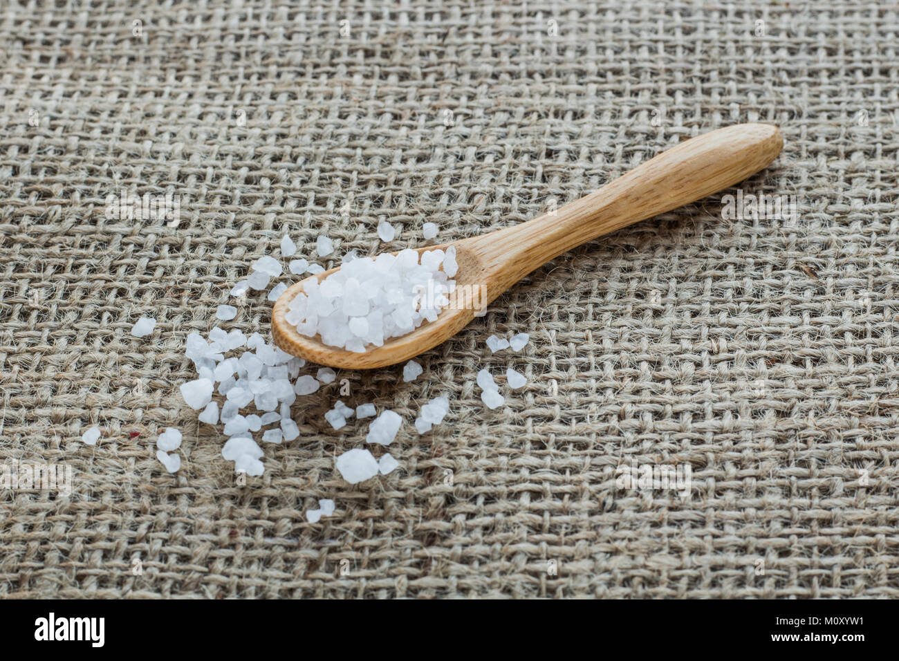salt crystals with wooden spoon Stock Photo - Alamy