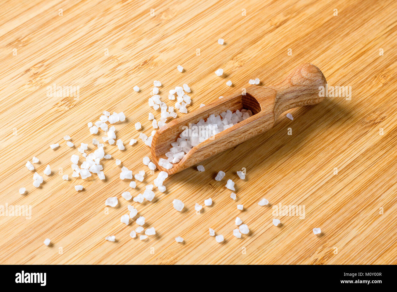 salt crystals with wooden spoon Stock Photo - Alamy