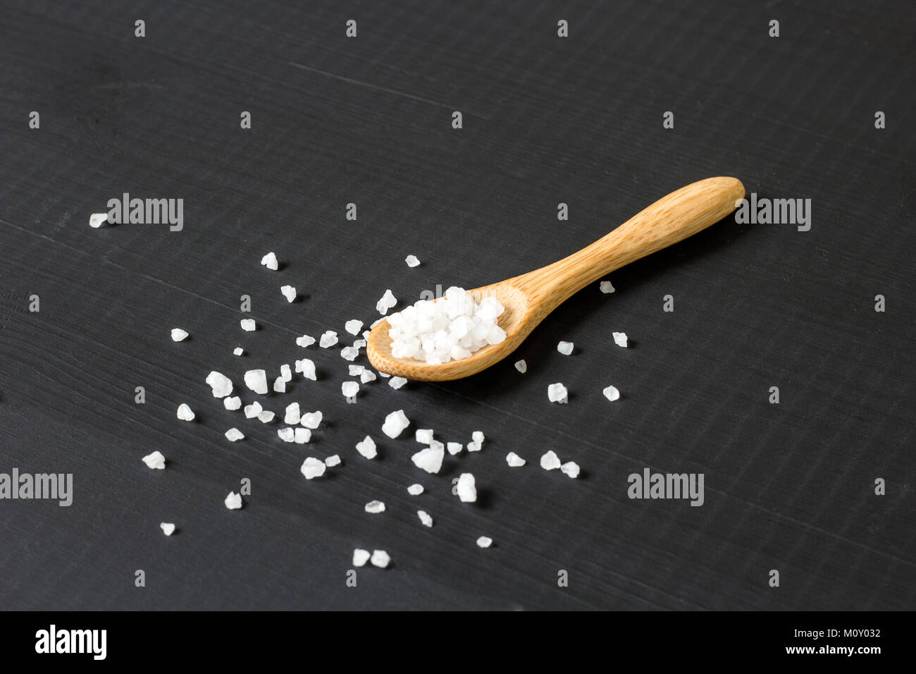 salt crystals with wooden spoon Stock Photo - Alamy