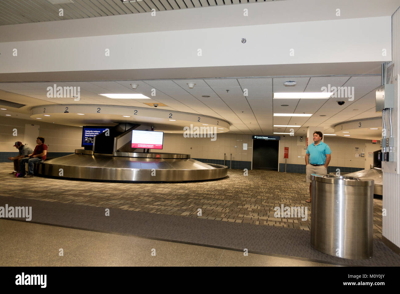 Minneapolis St Paul International Airport. People waiting for arrivals ...