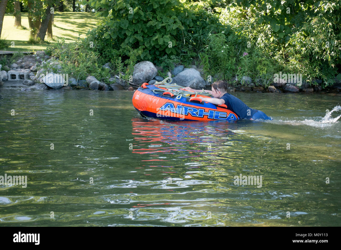 Inflatable donut water hi-res stock photography and images - Alamy