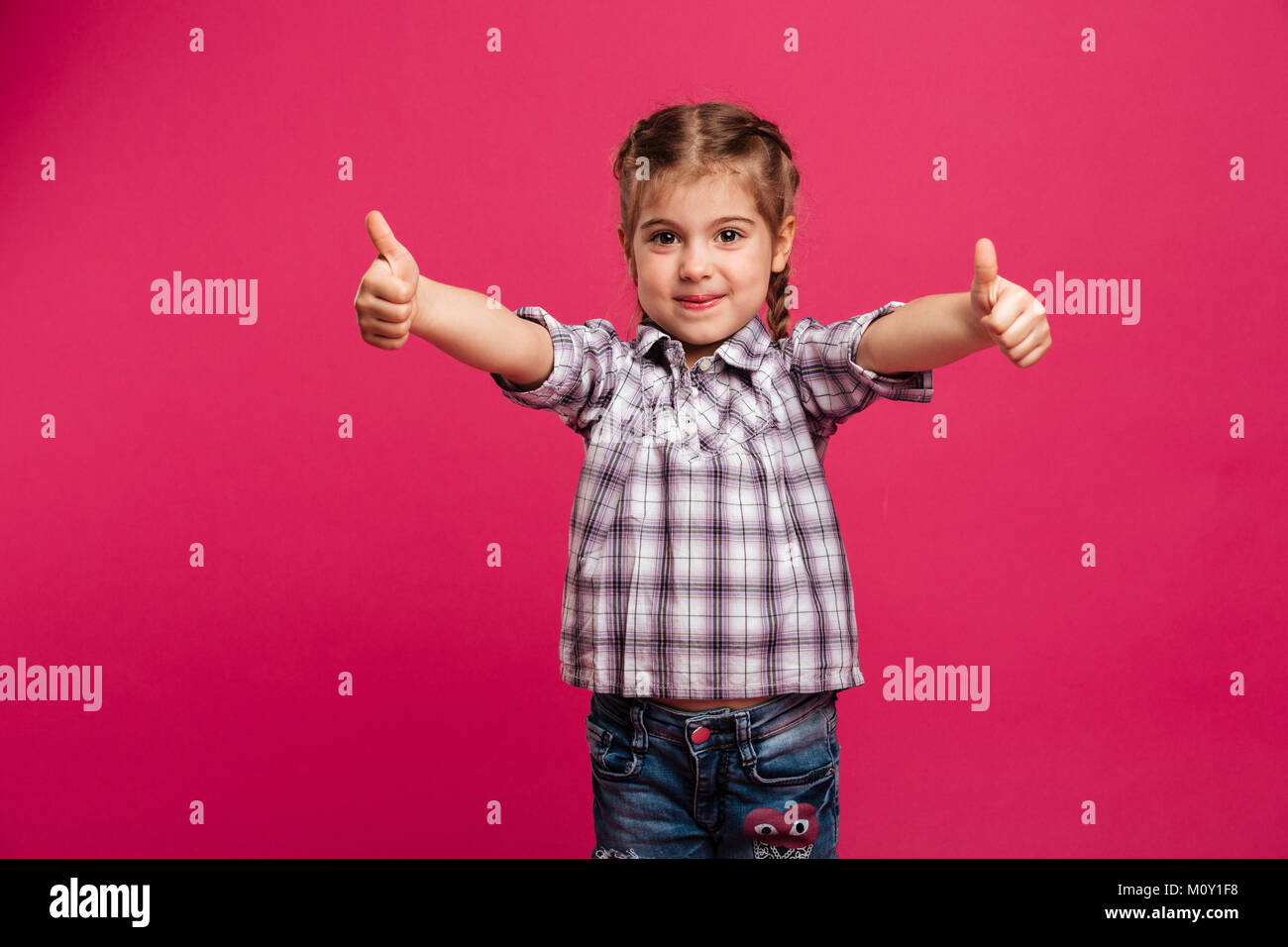 Image of happy cute little girl child standing isolated over pink ...
