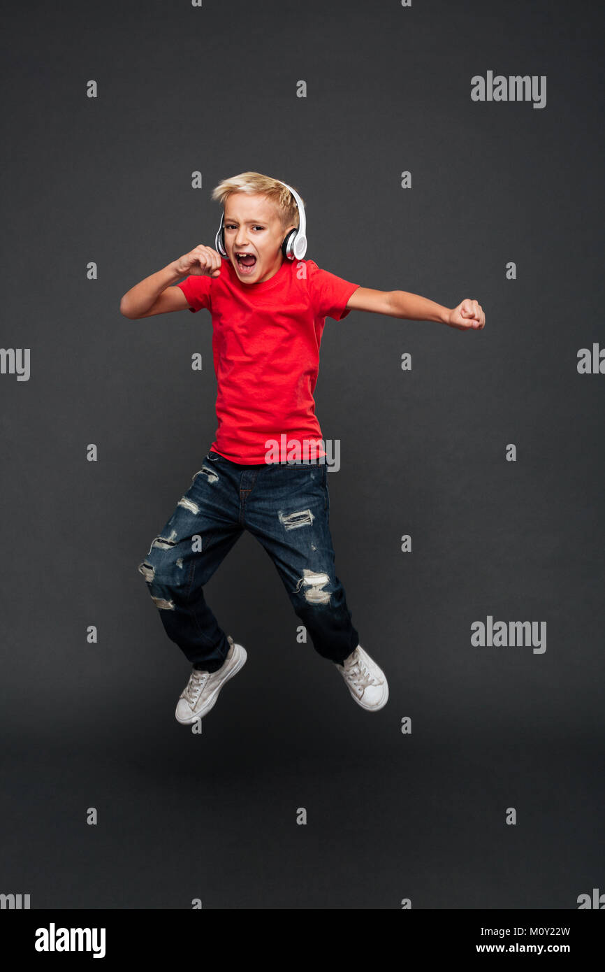 Boy jumping over camera hi-res stock photography and images - Alamy