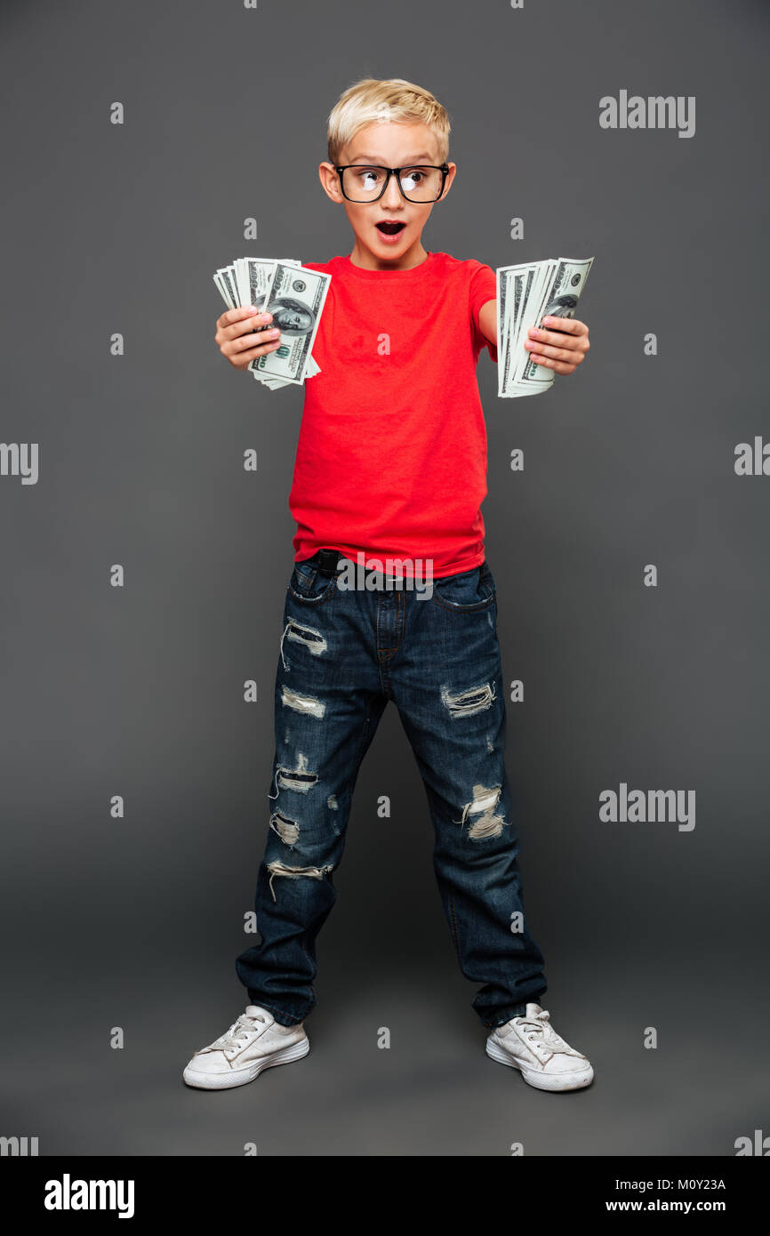 Picture of screaming surprised little boy child standing isolated over ...