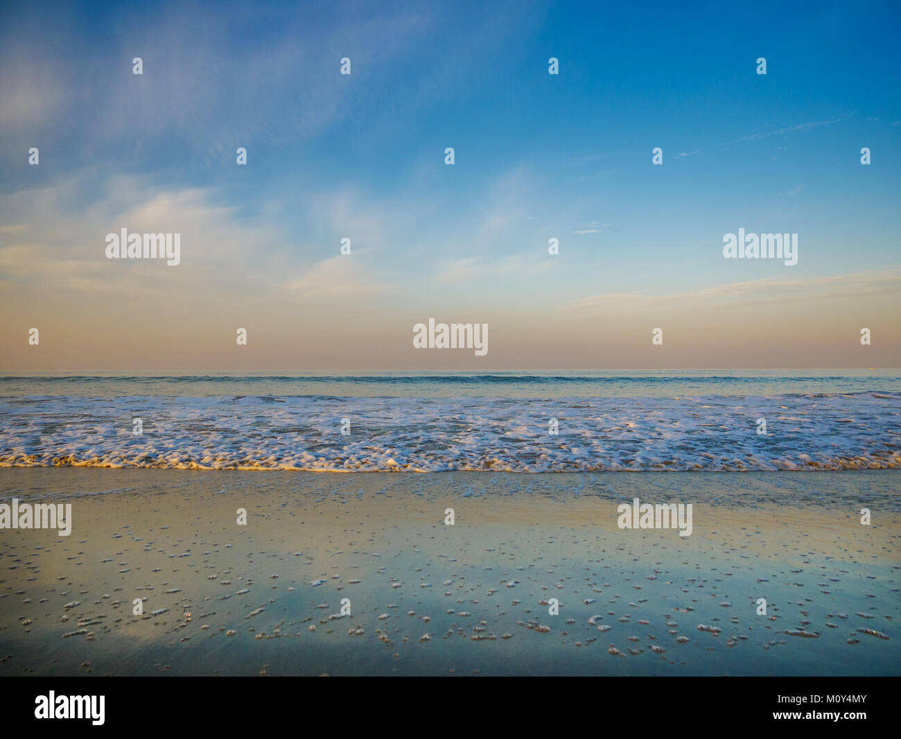 Sun and Beach with Colorful sky at North Goa, India Stock Photo - Alamy