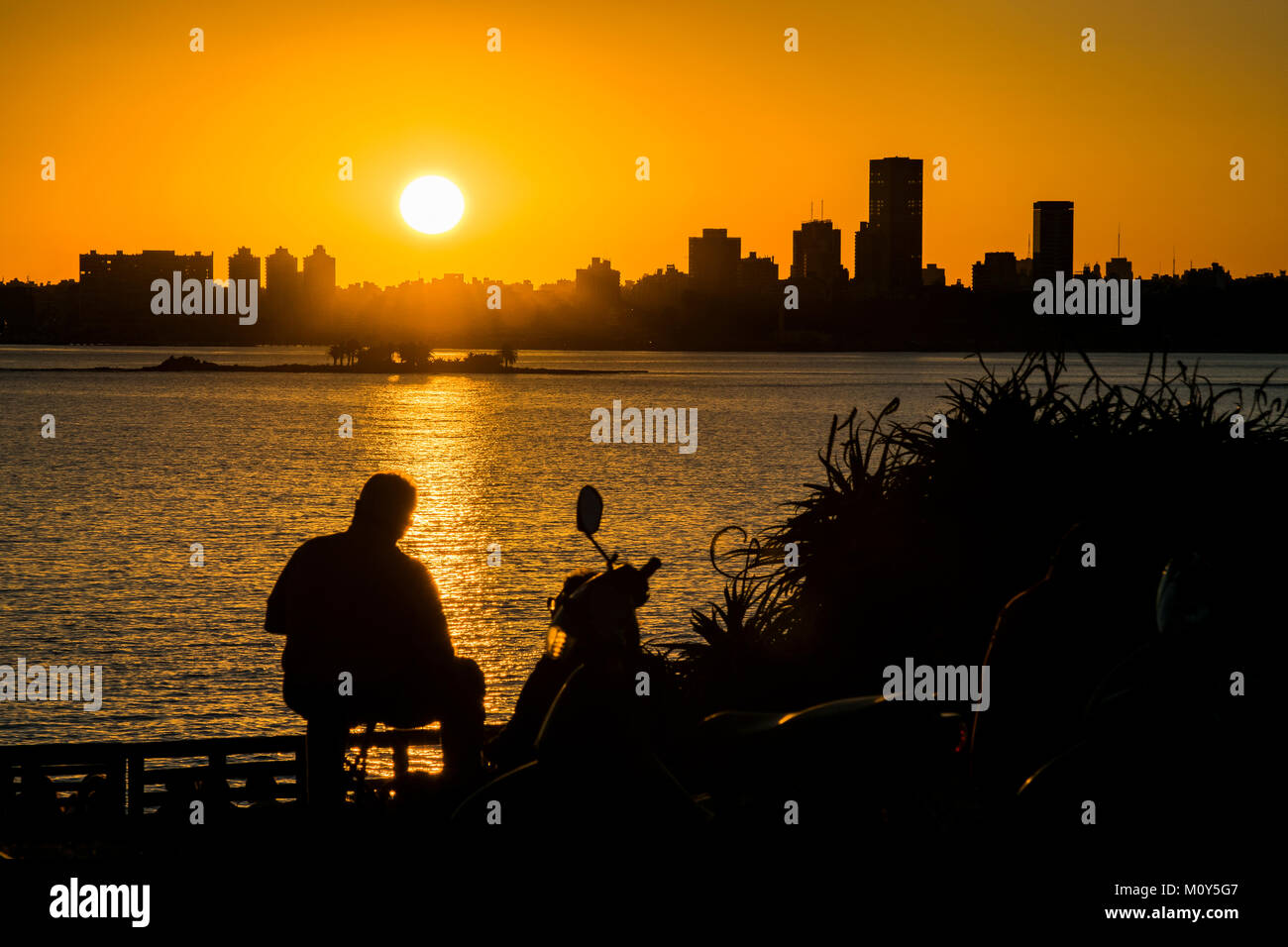 Silhouette sunset cityscape scene from plaza virgilio square in ...