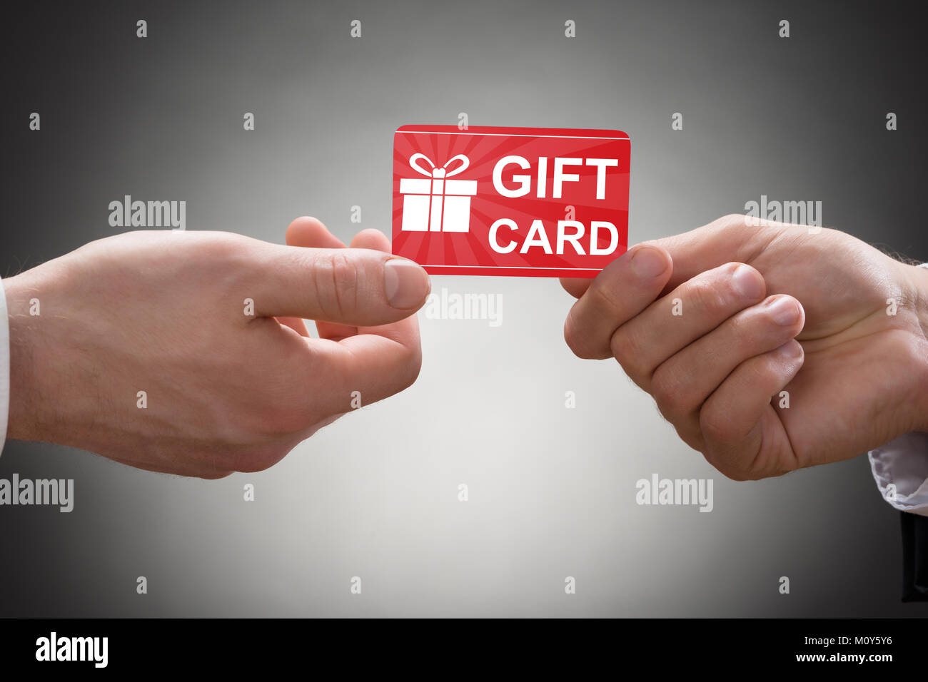 Hand holding gray card hi-res stock photography and images - Alamy