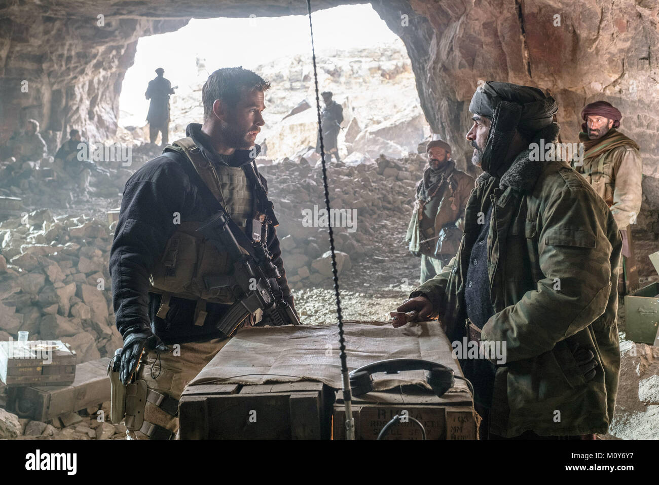 12 STRONG, from left: Chris Hemsworth, Navid Negahban, 2018. ph: David ...
