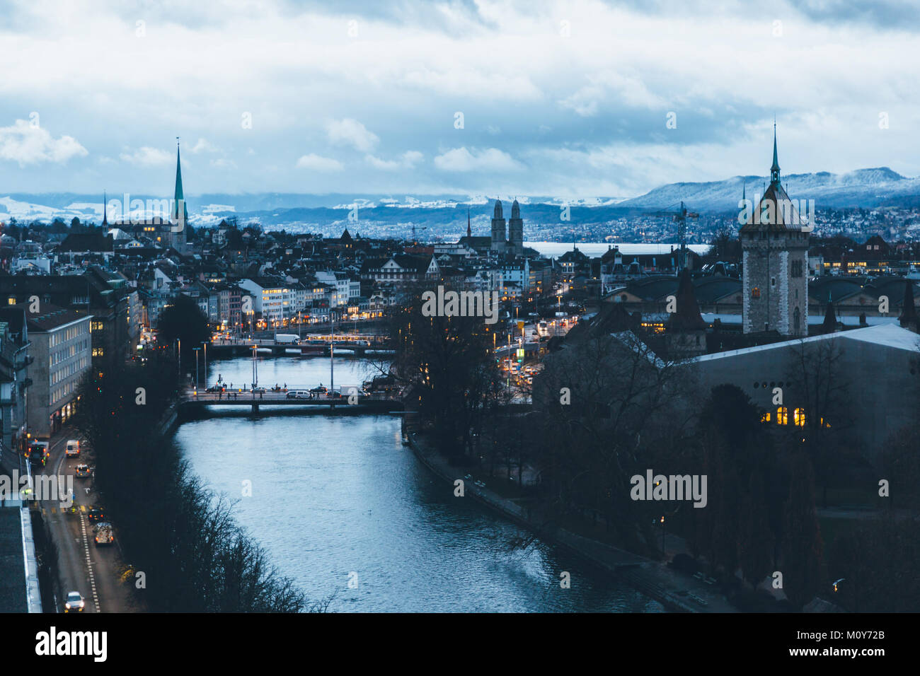 Aerial view of Zurich city center at dawn, with the Limmat river in the ...