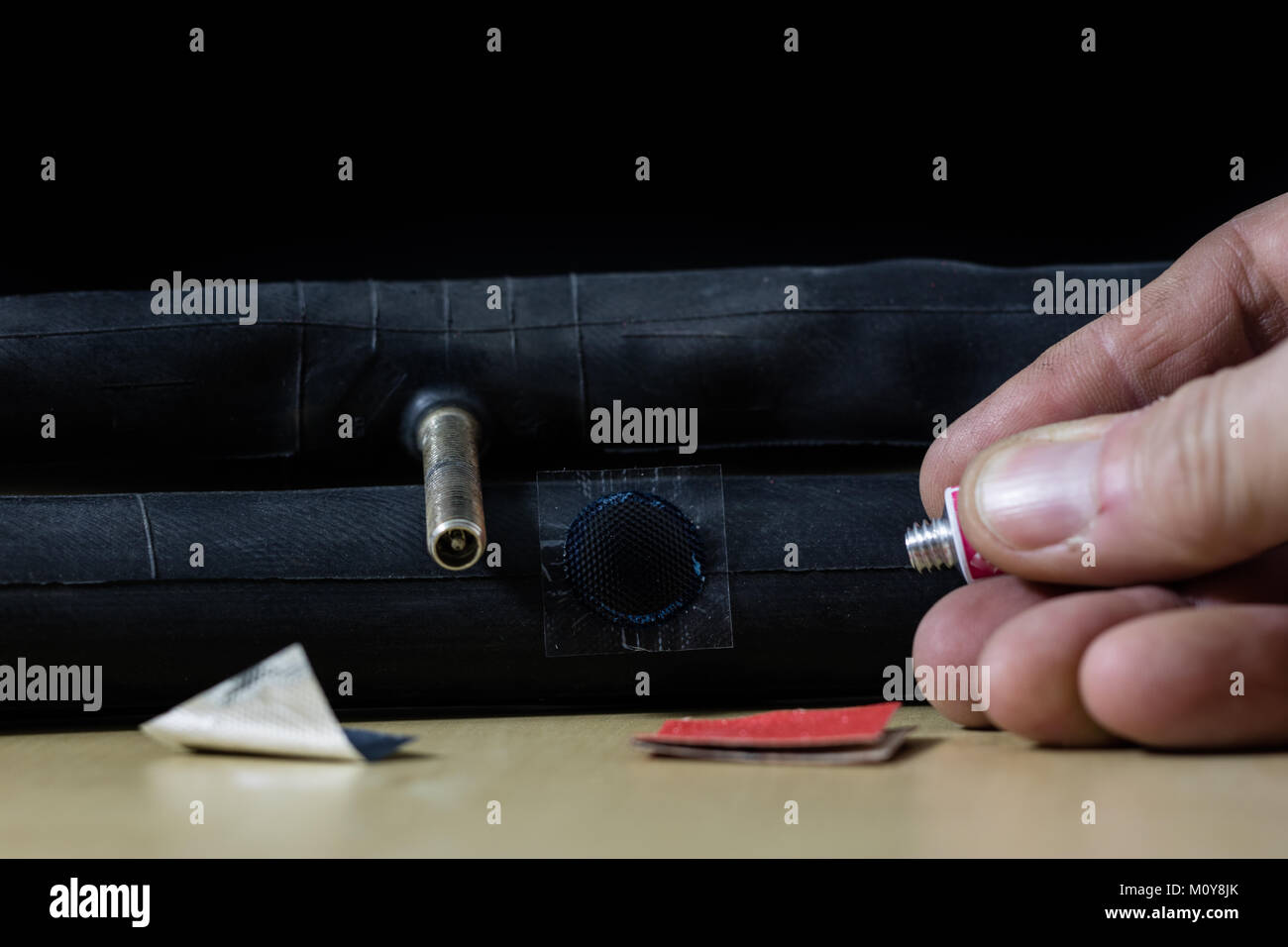 Bicycle breakdown during the trip. Sticking a bicycle tube in a ...