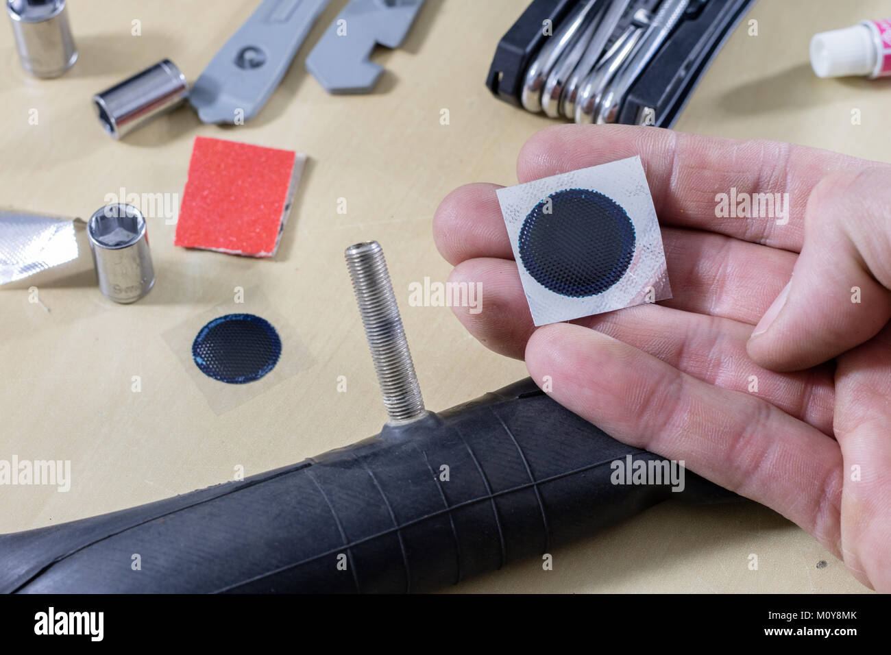 Bicycle breakdown during the trip. Sticking a bicycle tube in a ...