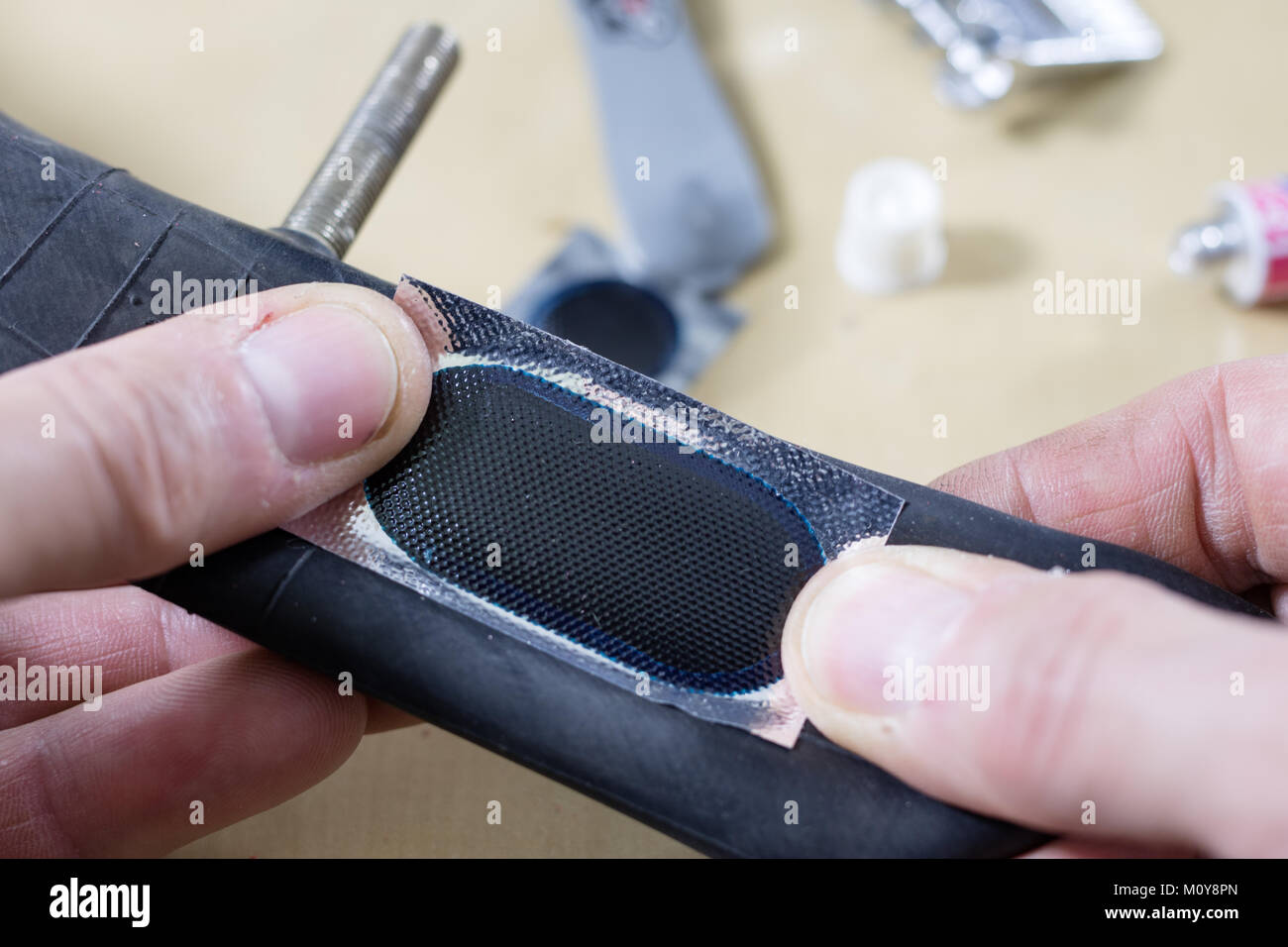 Bicycle breakdown during the trip. Sticking a bicycle tube in a ...