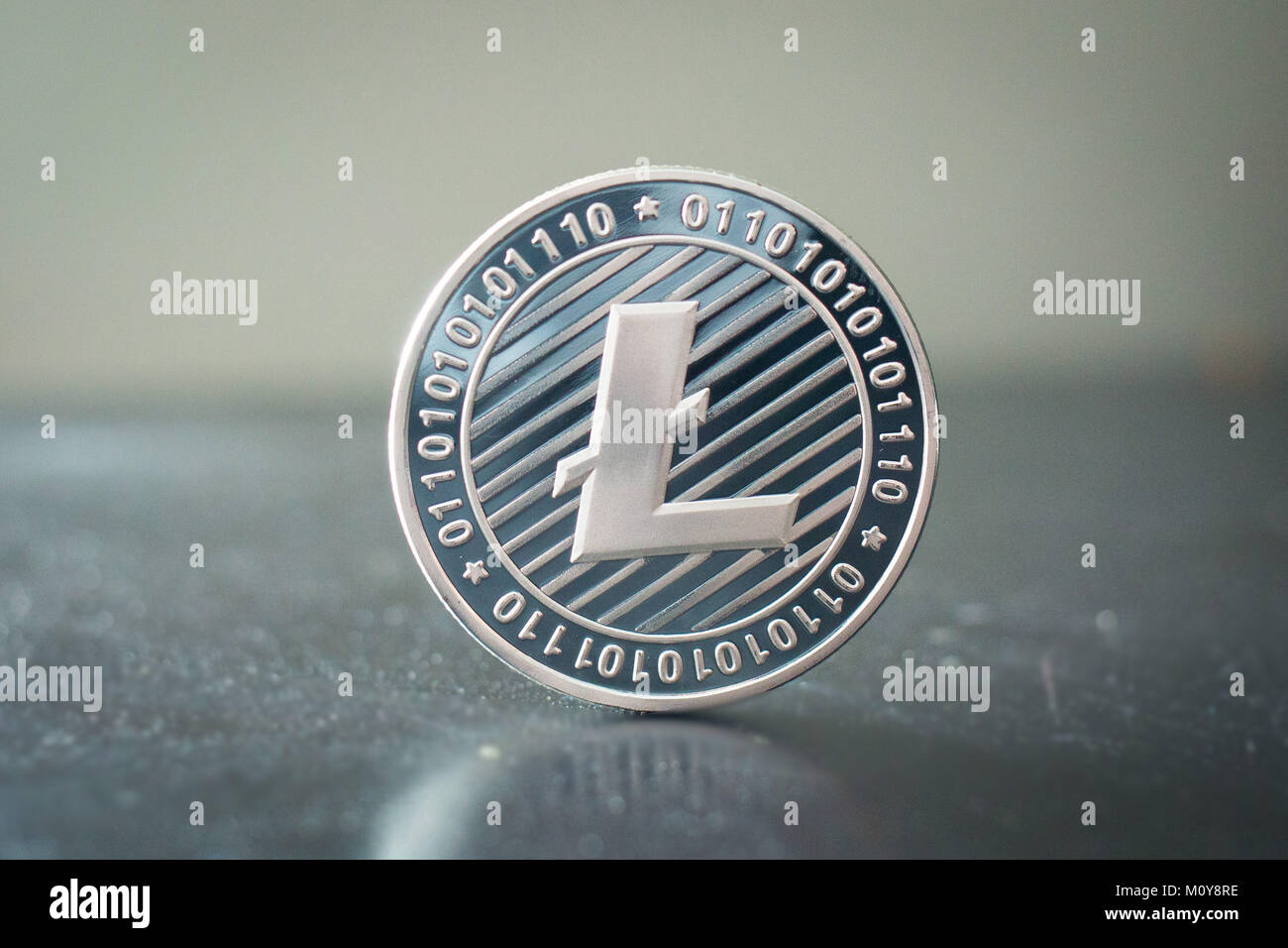Litecoin coin close up isolated coin single Stock Photo - Alamy