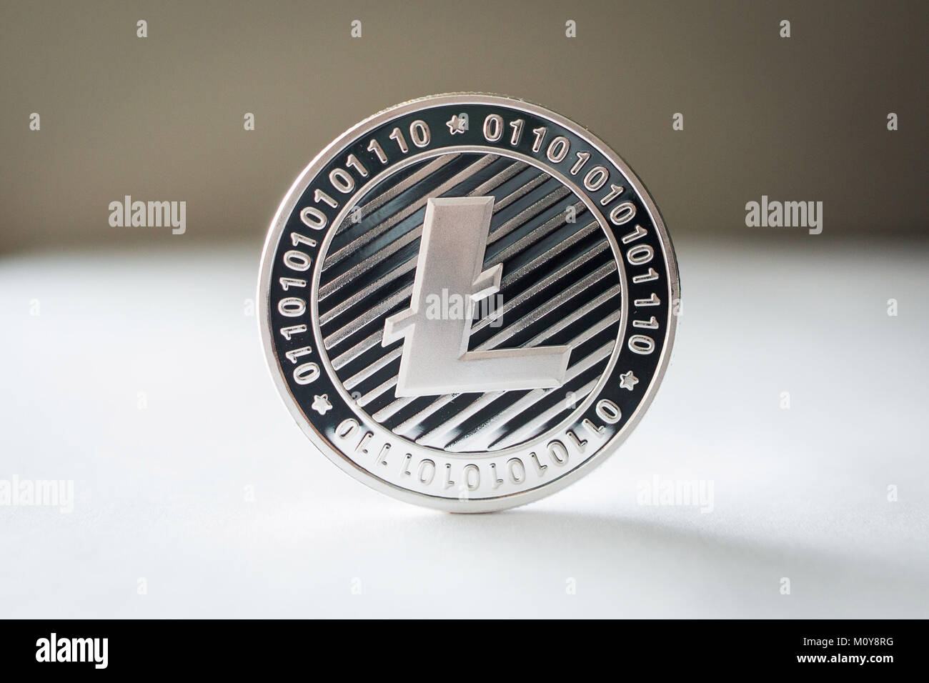 Litecoin coin close up isolated coin single Stock Photo - Alamy