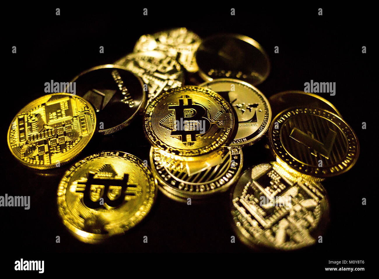 Bitcoin, litecoin, etherium coins close up dark theme Stock Photo - Alamy