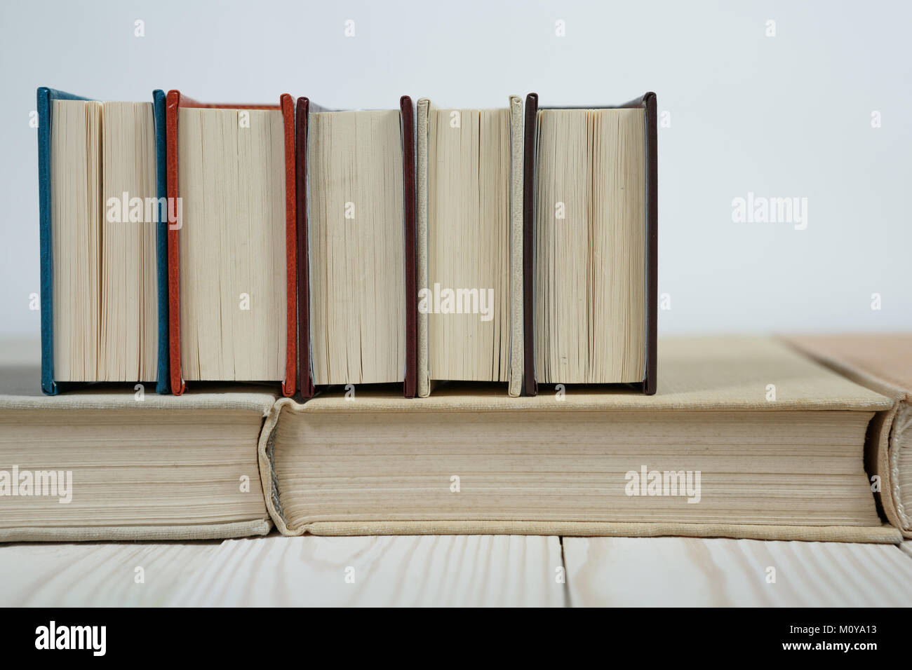 Pile of old books stacked on top of each other. Selective focus with copy space Stock Photo - Alamy