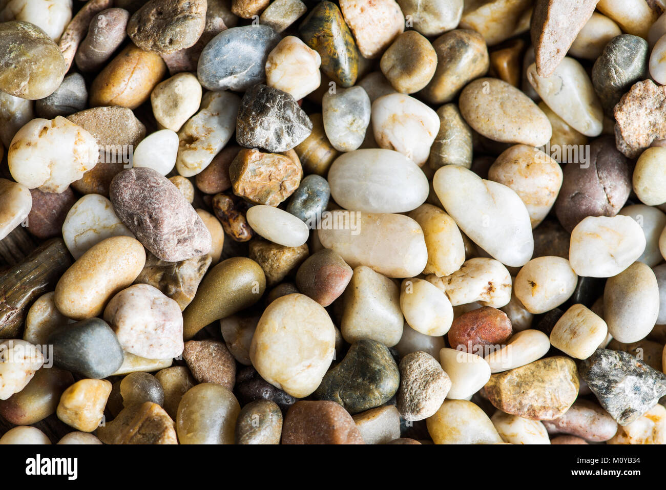 Many small stones forming with different colours, like a background ...