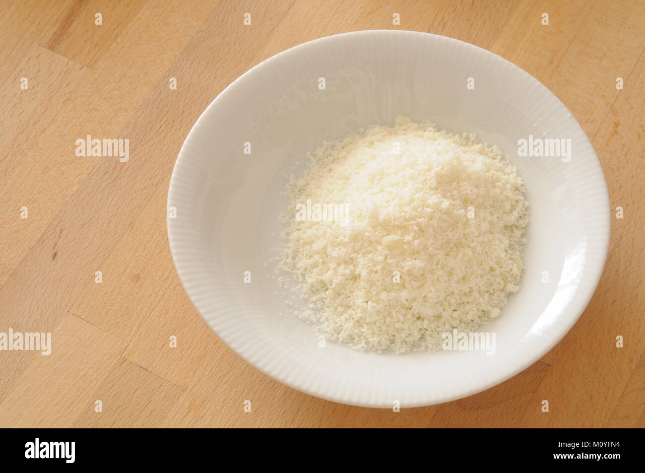 bowl of grated parmesan cheese Stock Photo - Alamy