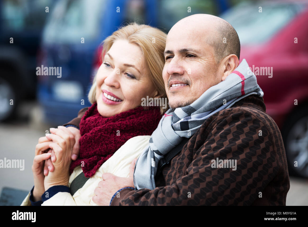 Portrait of elderly spouses relaxing during city walk Stock Photo - Alamy
