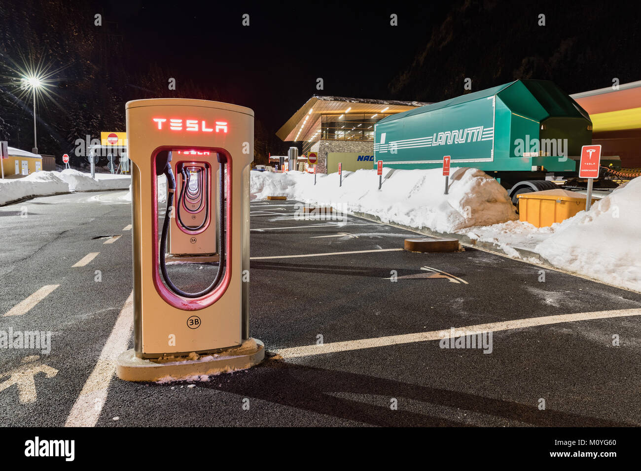 BRENNER, ITALY - JANUARY, 24, 2018: Tesla supercharger in winter. Tesla ...