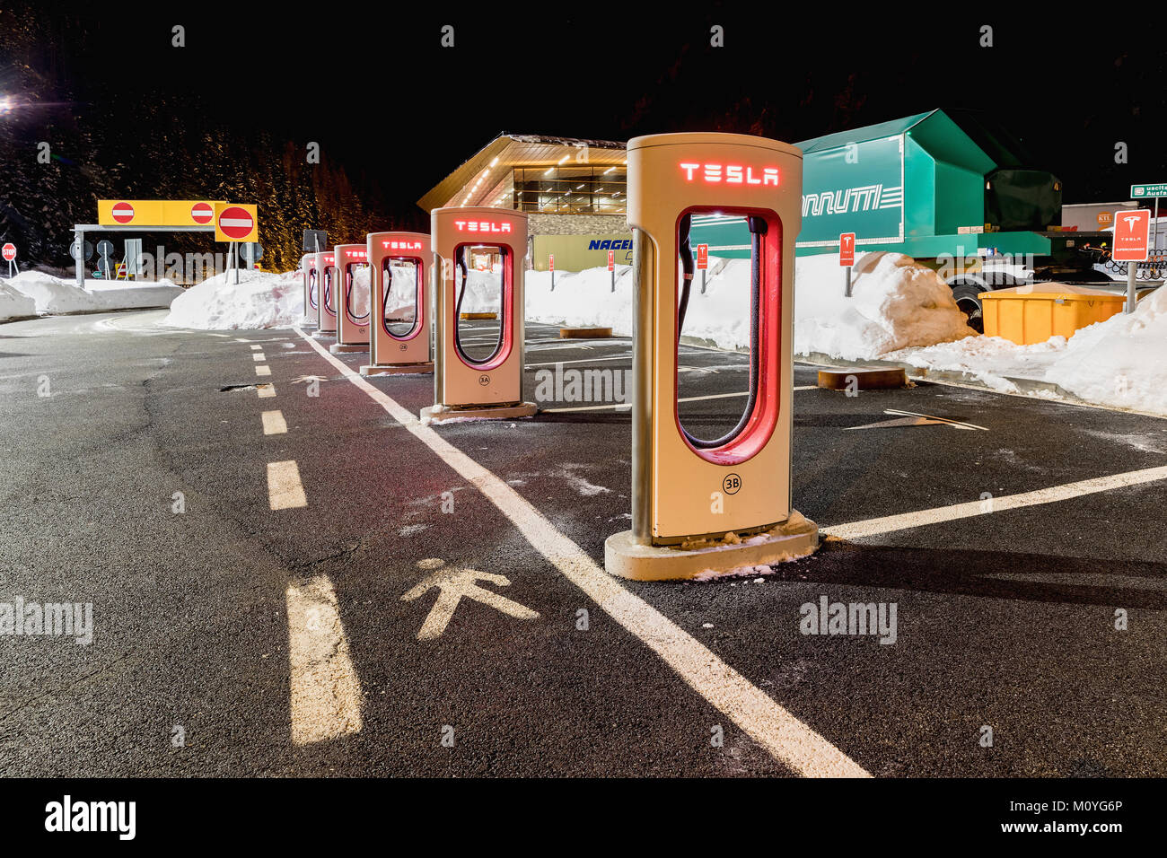 BRENNER, ITALY - JANUARY, 24, 2018: Tesla supercharger in winter. Tesla ...