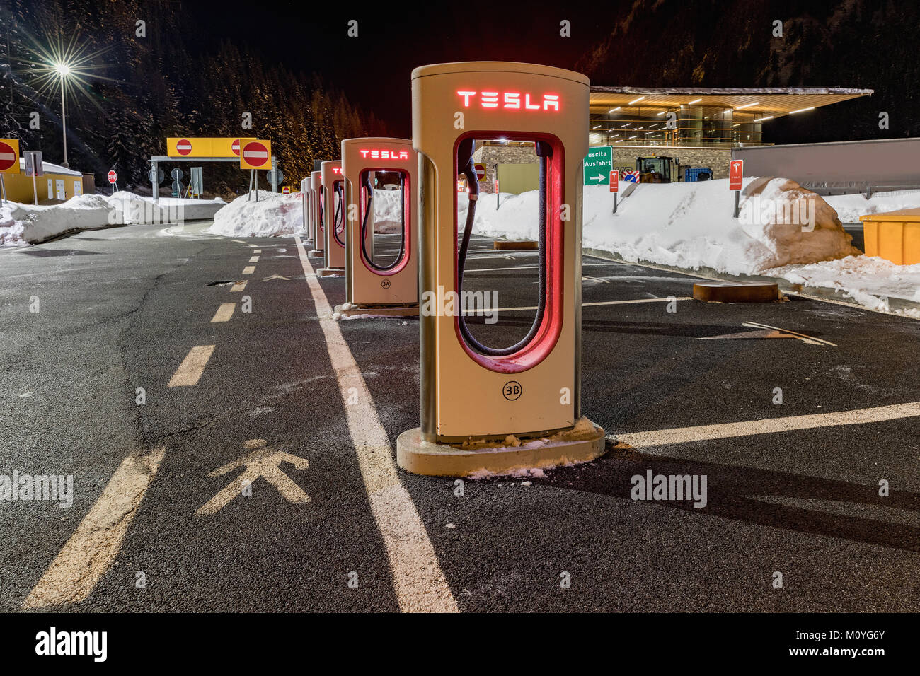 BRENNER, ITALY - JANUARY, 24, 2018: Tesla supercharger in winter. Tesla ...