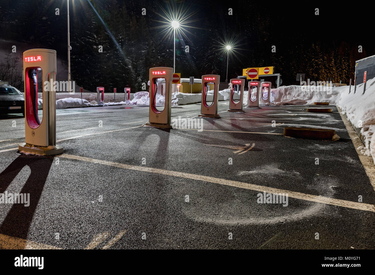 BRENNER, ITALY - JANUARY, 24, 2018: Tesla supercharger in winter. Tesla ...