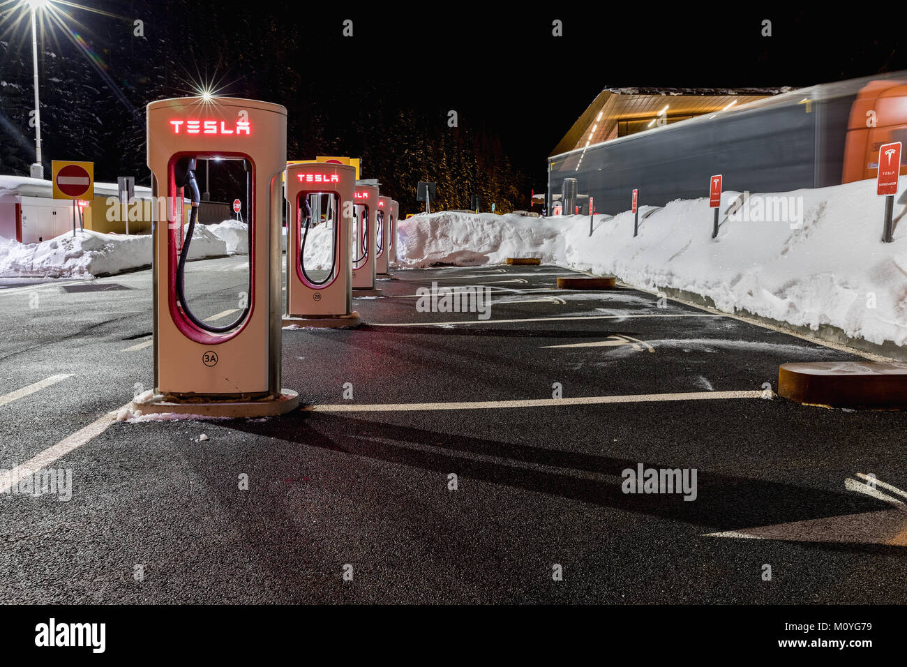 BRENNER, ITALY - JANUARY, 24, 2018: Tesla supercharger in winter. Tesla ...