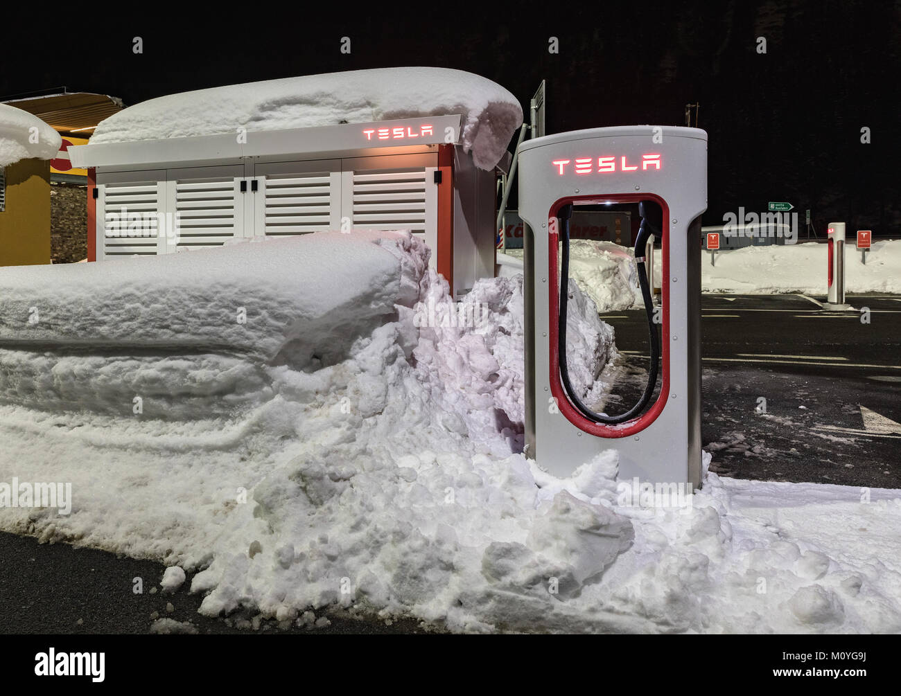 BRENNER, ITALY - JANUARY, 24, 2018: Tesla supercharger in winter under ...