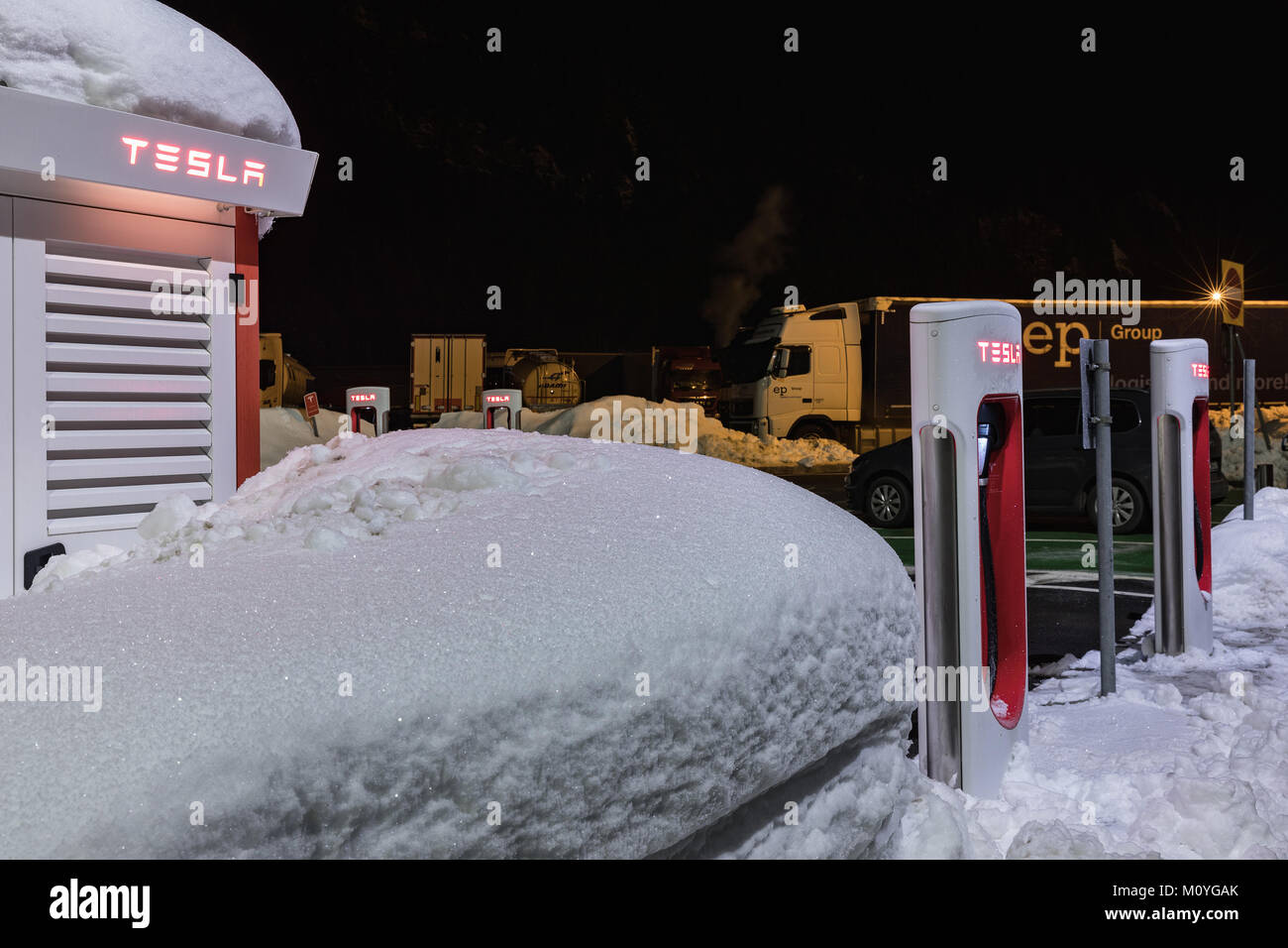 BRENNER, ITALY - JANUARY, 24, 2018: Tesla supercharger in winter under ...
