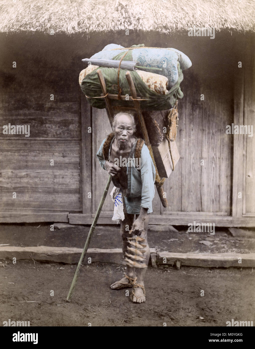 Porter with his load, Japan, c.1880's Stock Photo - Alamy