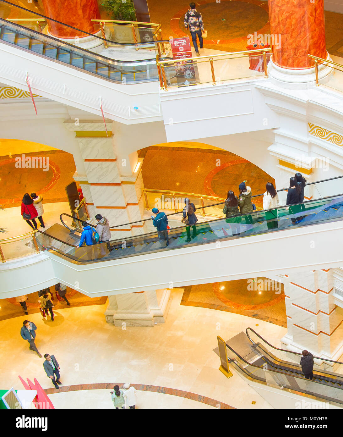 SHANGHAI, CHINA - DECEMBER 28, 2016: Escalators at Global Harbor is a ...
