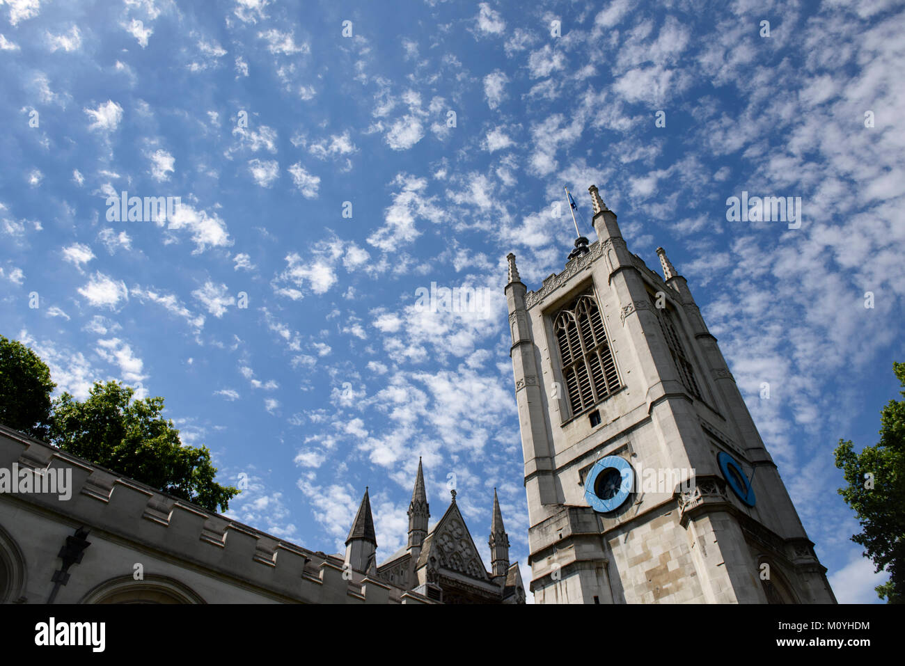 St Margaret's Church tower Sundial against the blue sky, Westminster ...