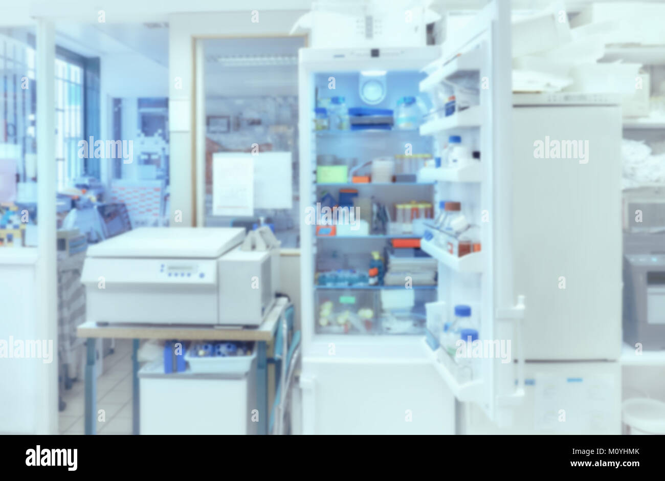 Scientific background: blurred interior of modern laboratory with ...