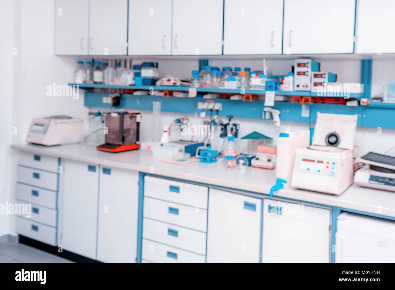 Scientific background: modern laboratory interior out of focus, text ...