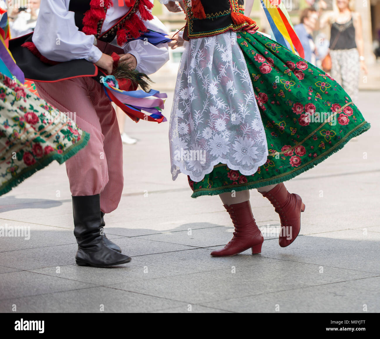 Polish folk dance group with traditional costume Stock Photo - Alamy