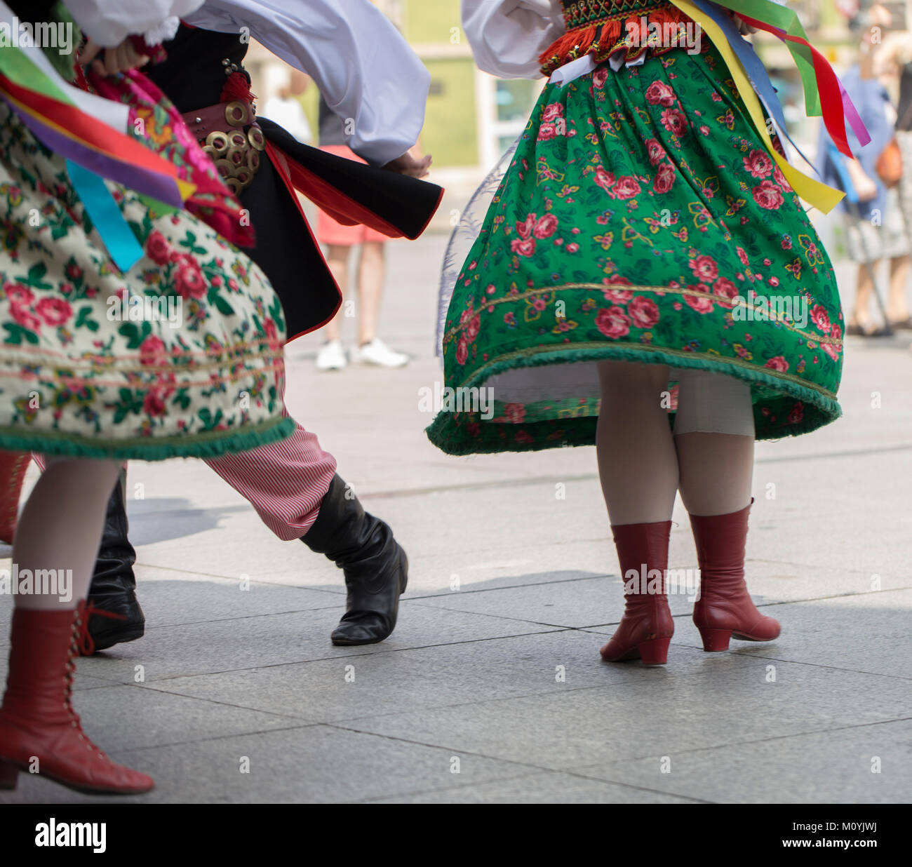 Polish folk dance group with traditional costume Stock Photo - Alamy