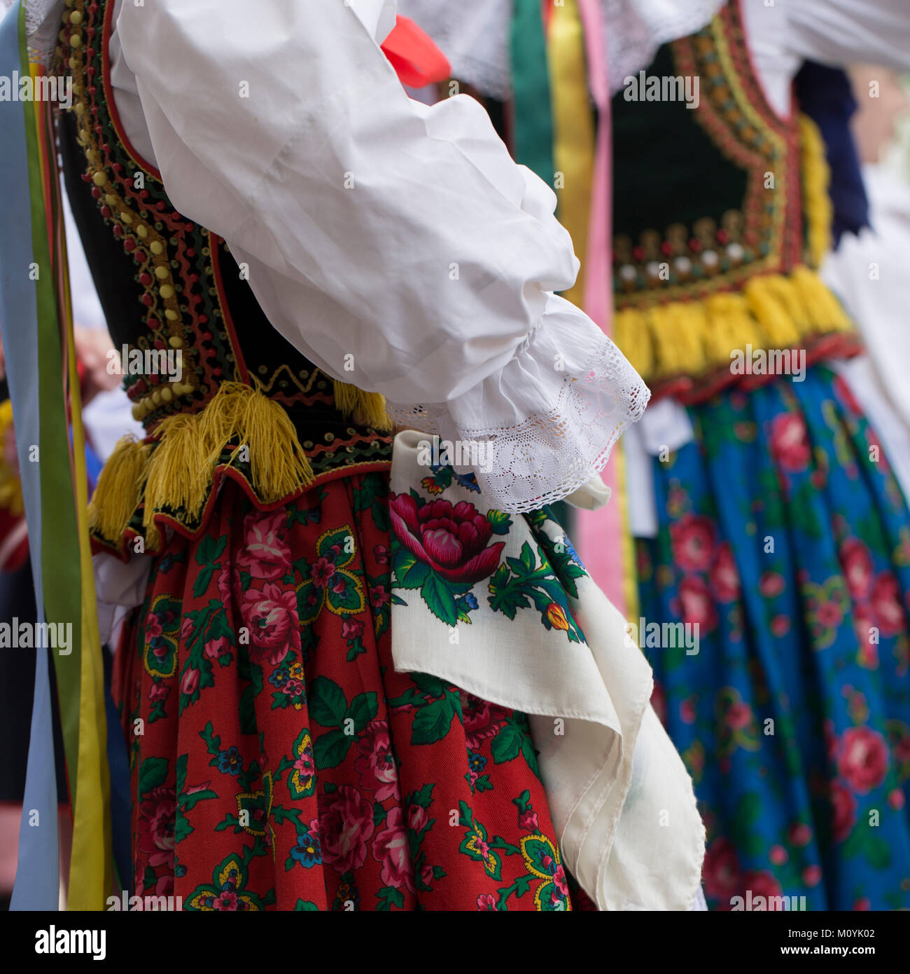 Polish folk dance goup with traditional costume Stock Photo - Alamy