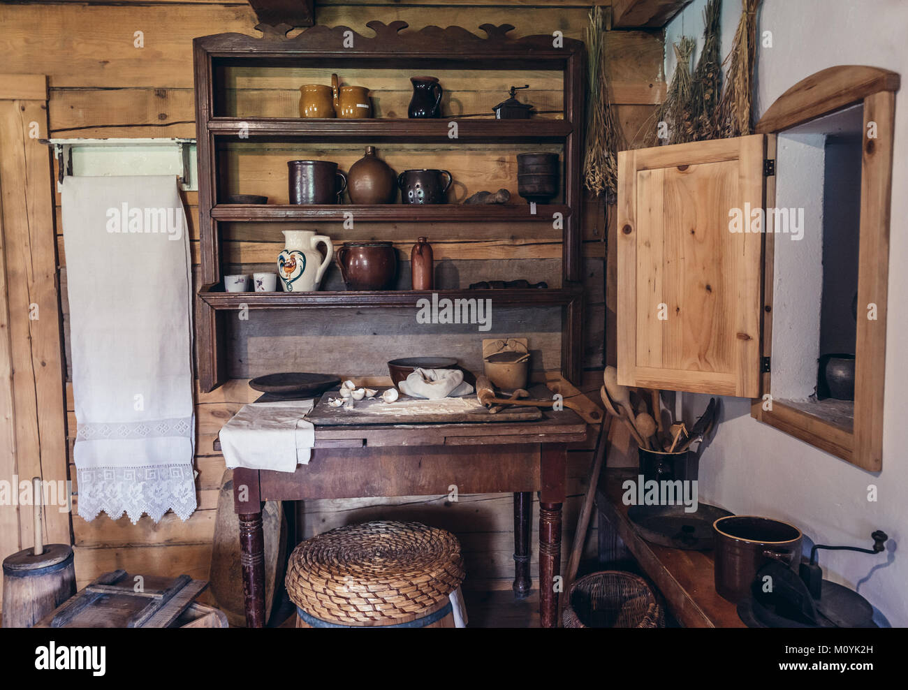 Interior of kitchen in traditional wooden Polish cottage in Museum of ...