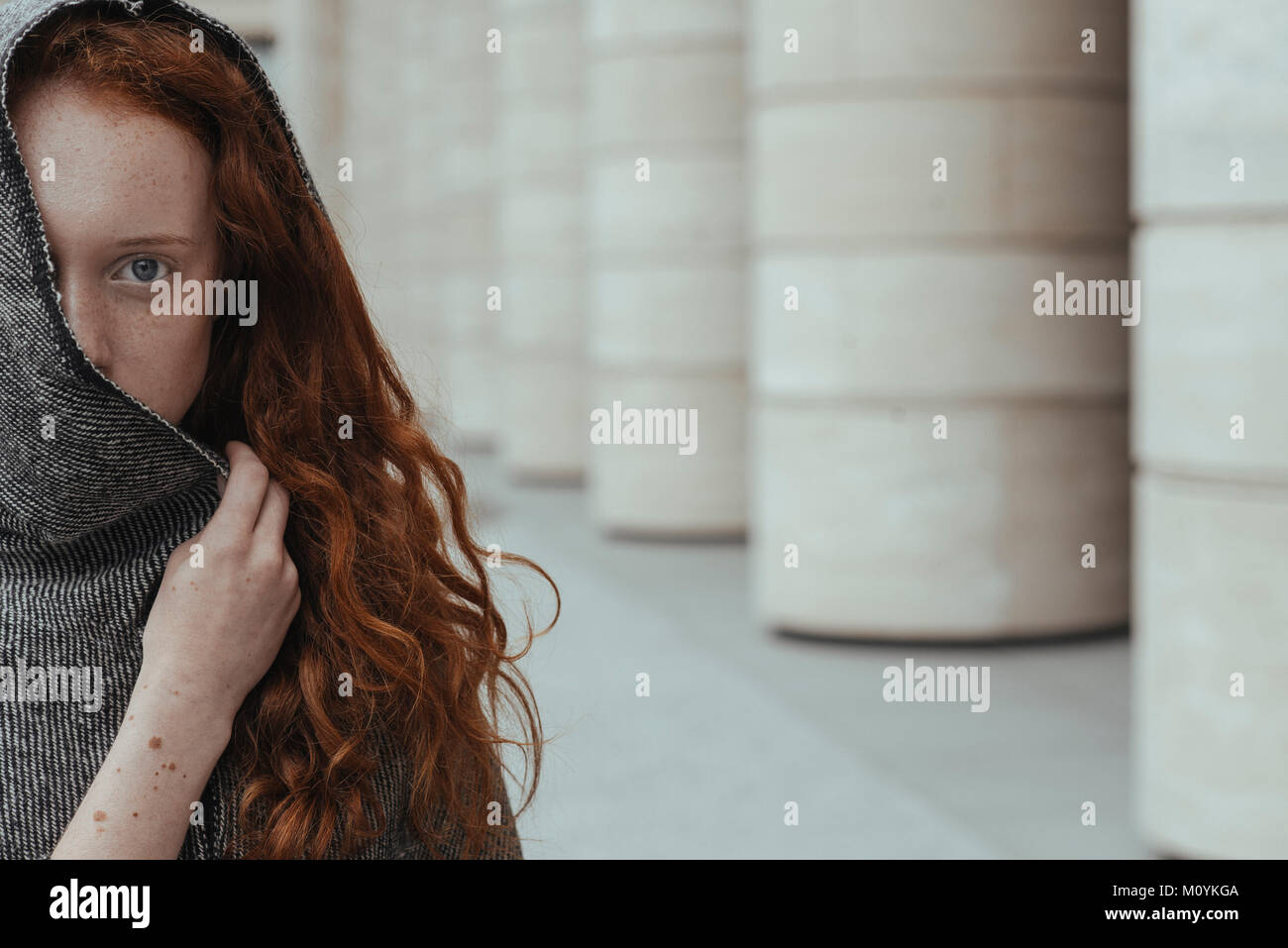 Lady hiding hi-res stock photography and images - Alamy