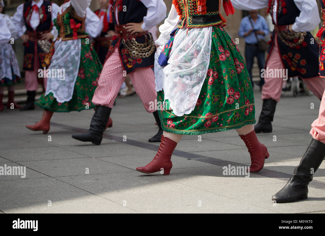 Polish folk dance group with traditional costume Stock Photo - Alamy