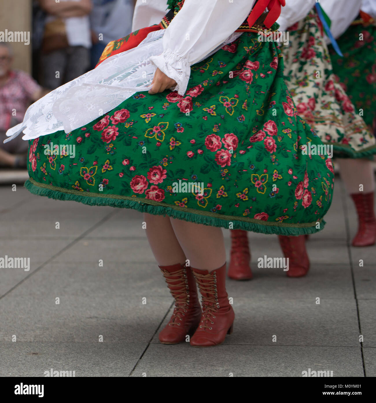 Polish folk dance group with traditional costume Stock Photo - Alamy