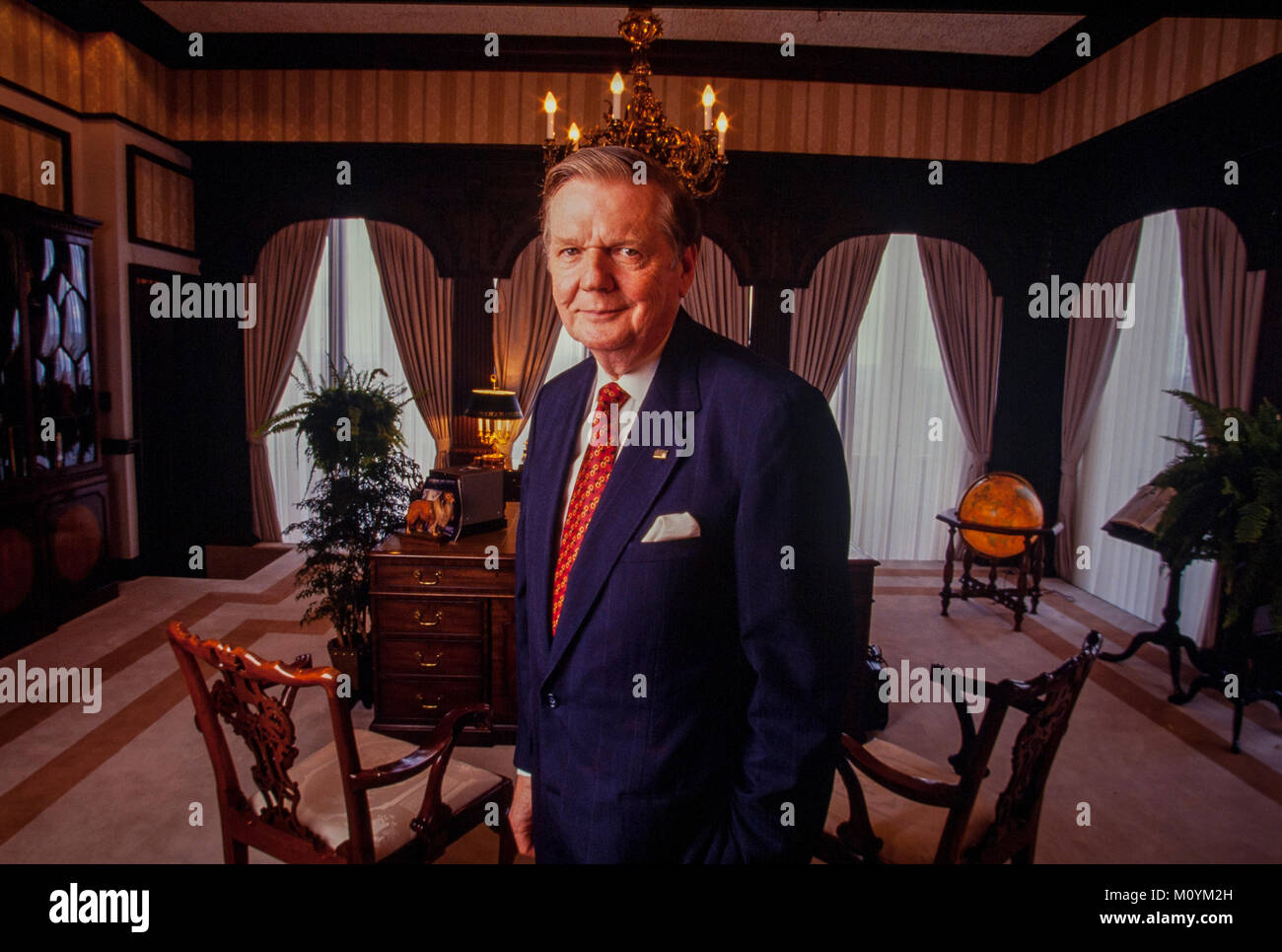 Paul S. Amos - in his AFLAC office. AFLAC was founded by brothers John ...