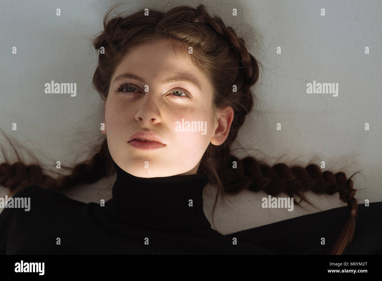 Portrait of serious Caucasian woman looking up Stock Photo - Alamy