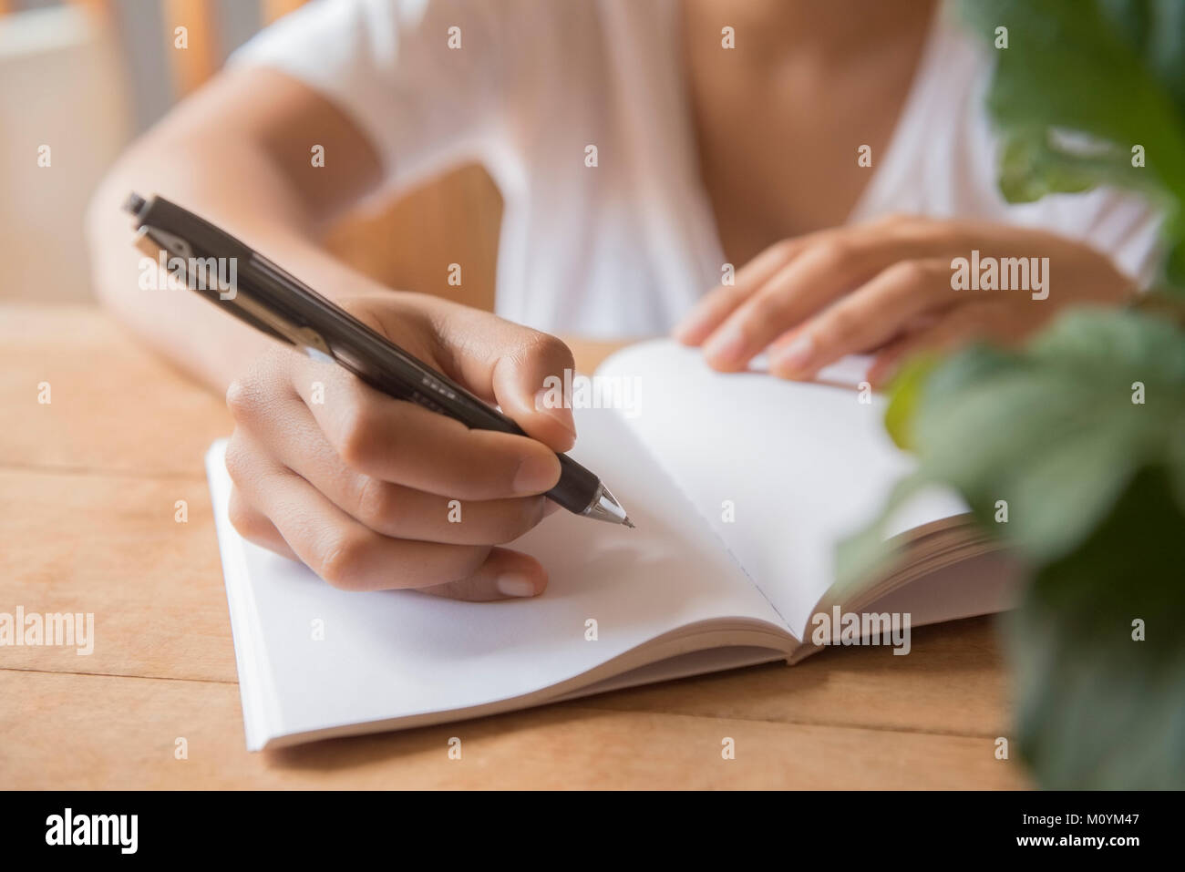 Seated african woman hi-res stock photography and images - Alamy