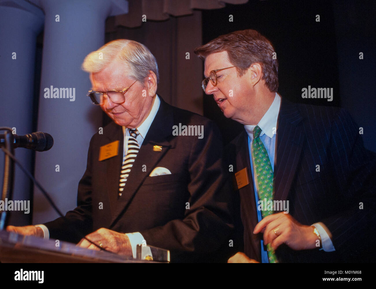 Paul S. Amos (left) and AFLAC CEO Dan Amos at a shareholders meeting ...
