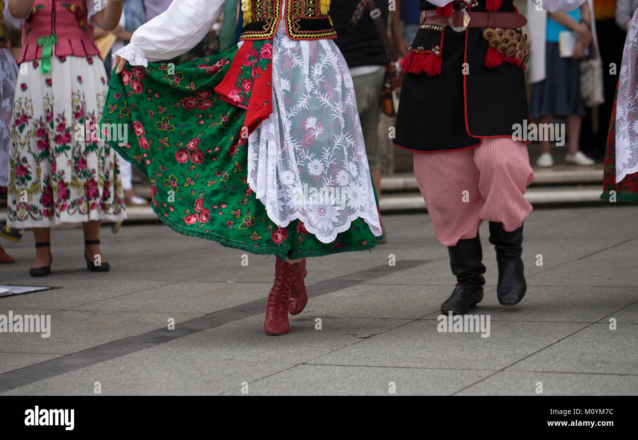 Polish folk dance group with traditional costume Stock Photo - Alamy